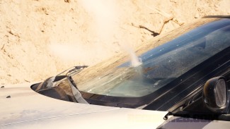 Shooting Through Glass